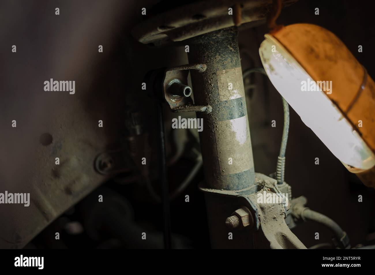 Replacement and repair of wheels and shock absorbers on a car Stock ...