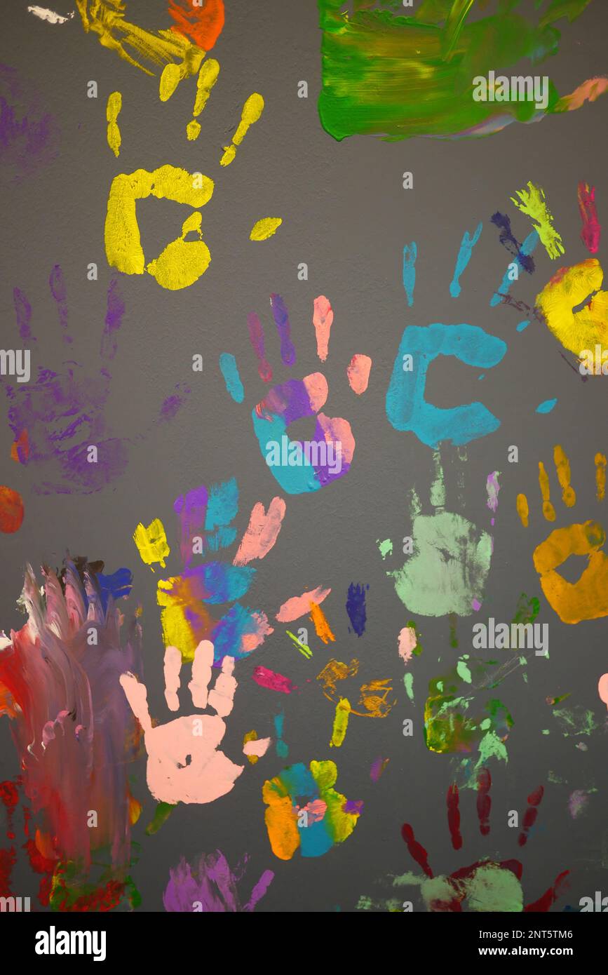 children's hands marks on wall Stock Photo - Alamy