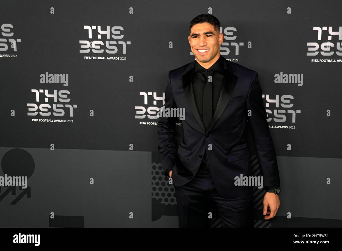 Moroccan player Achraf Hakimi poses on the green carpet before the ...