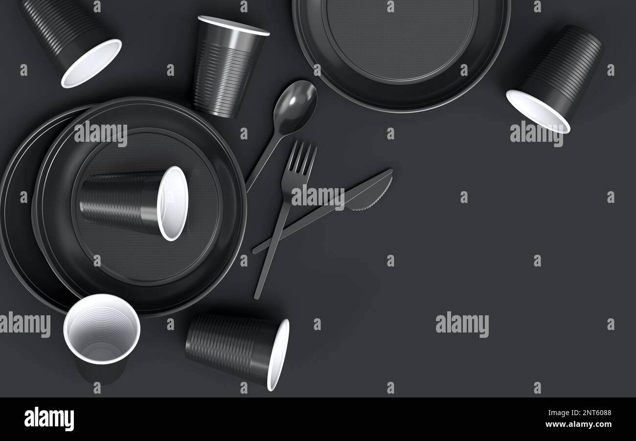 Set of disposable utensils like plate, folk, spoon,knife and cup on ...