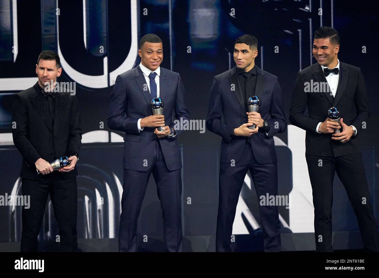 Lionel Messi, left, Kylian Mbappe, second left, Achraf Hakimi, second right and Casemiro pose ...