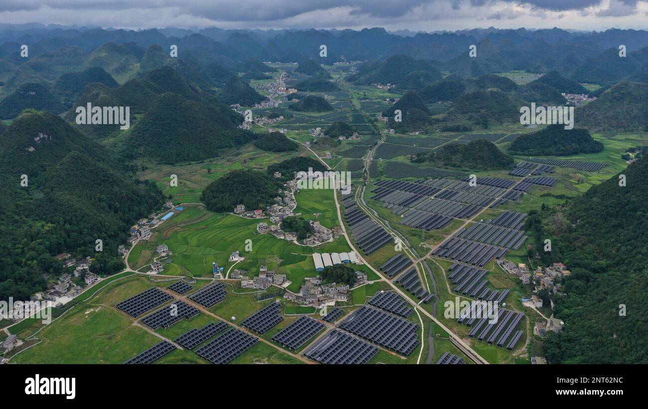 Aerial view of a photovoltaic station in Yangfang village in Anlong in ...