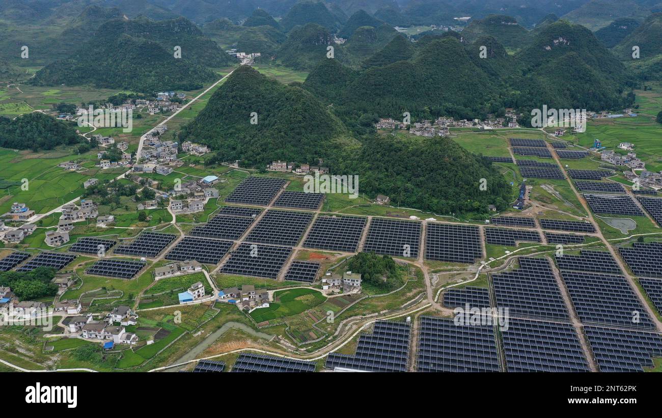 Aerial view of a photovoltaic station in Yangfang village in Anlong in ...