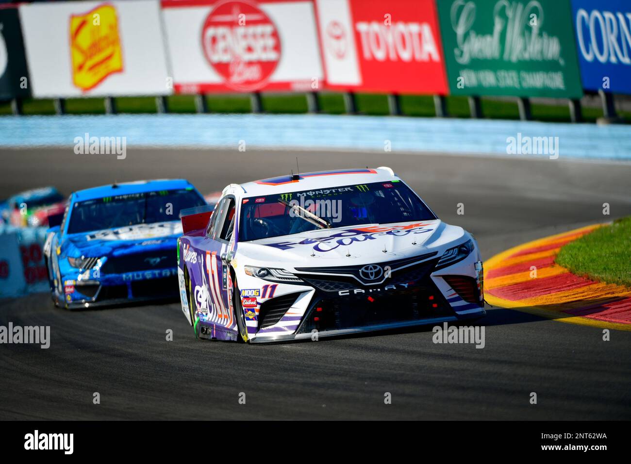 #11: Denny Hamlin, Joe Gibbs Racing, Toyota Camry FedEx Cares leads #4 ...