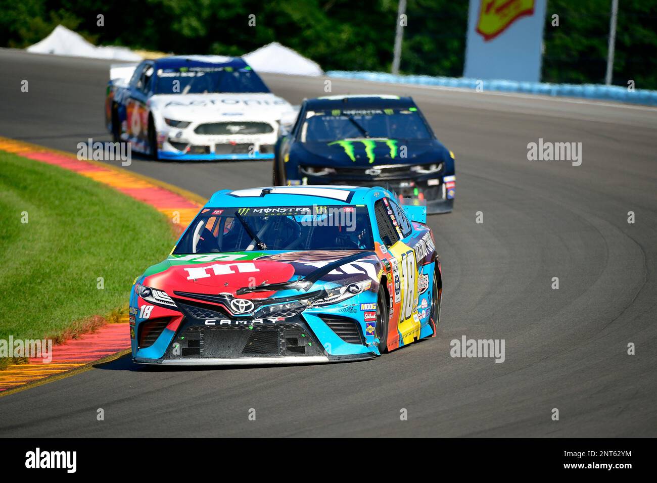 #18: Kyle Busch, Joe Gibbs Racing, Toyota Camry M&M's Hazelnut leads #1 ...