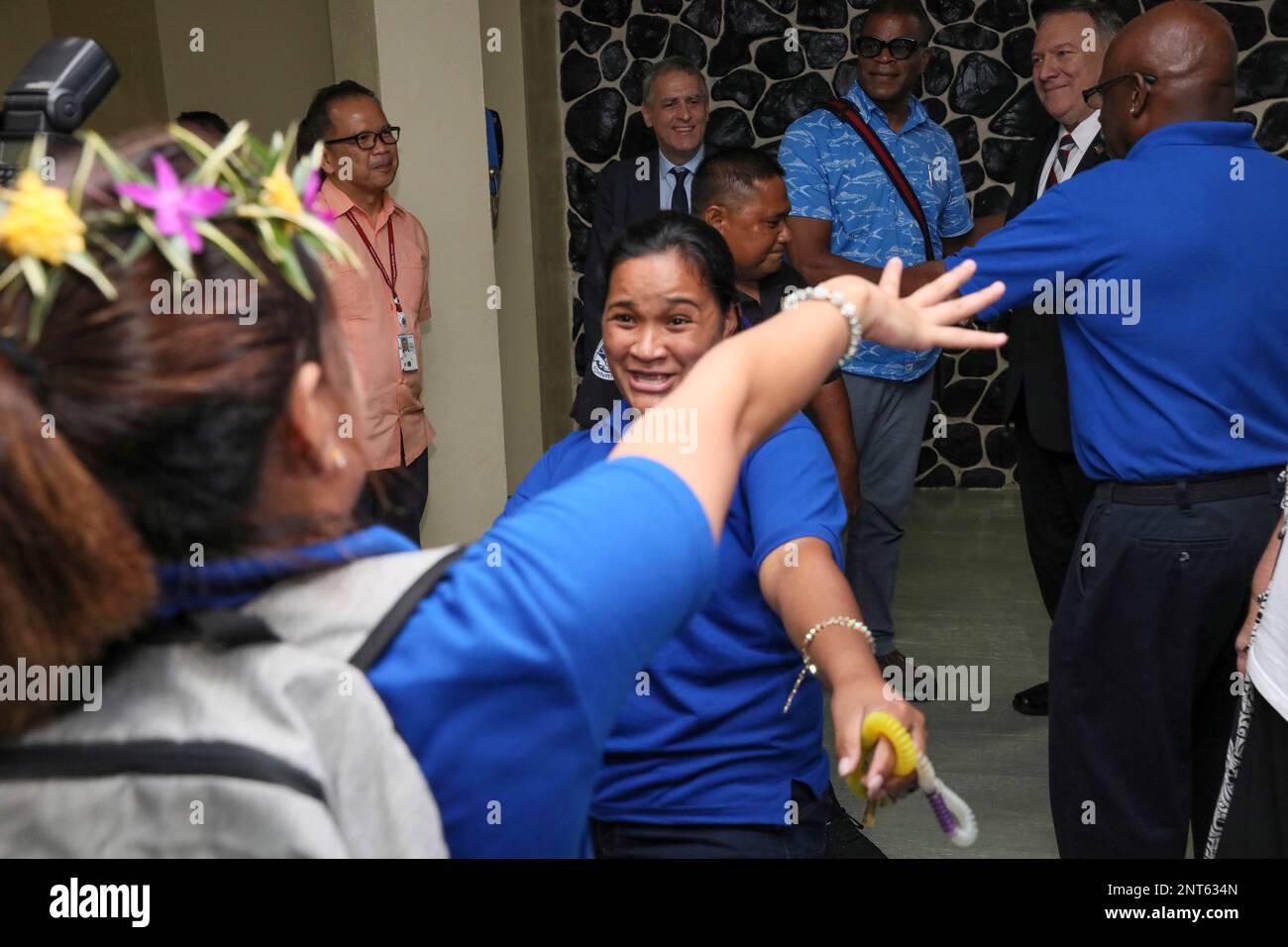 U.S. embassy staff members react after meeting Secretary of State Mike ...