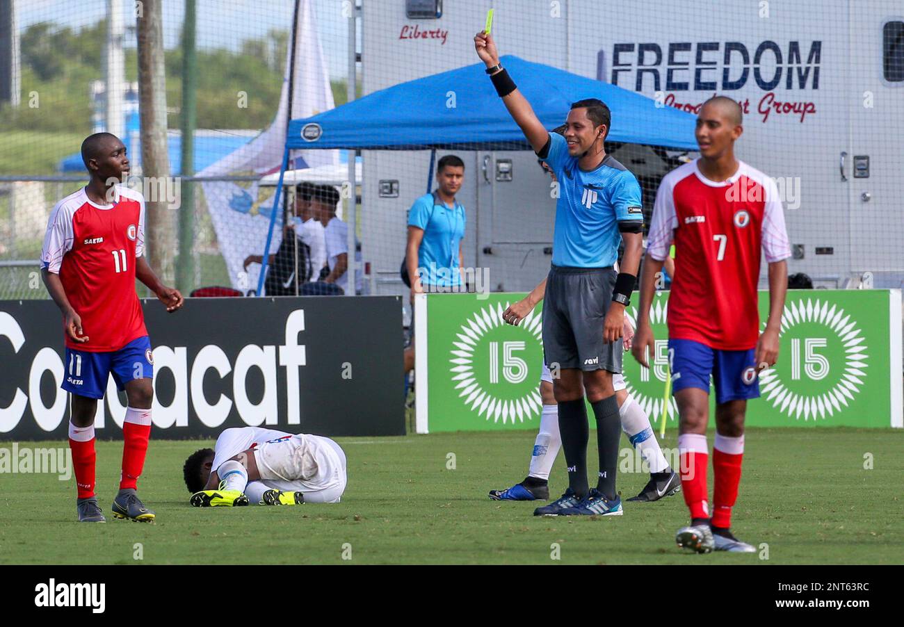 Team Haiti forward Shelby Phanor (11) receives a yellow card during a CONCACAF boys under-15 ...