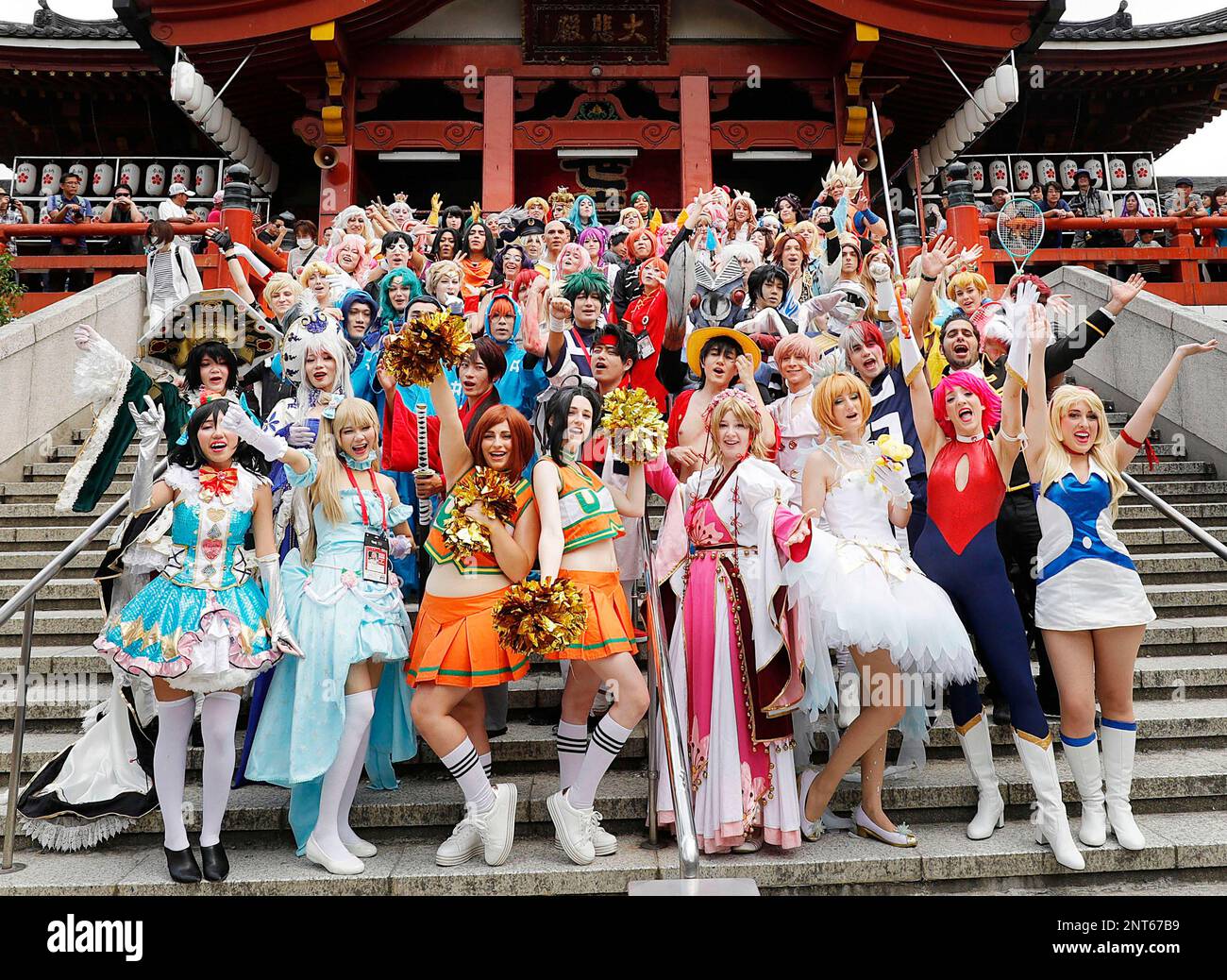 Participants dressed in their favorite Japanese "anime" characters pose ...