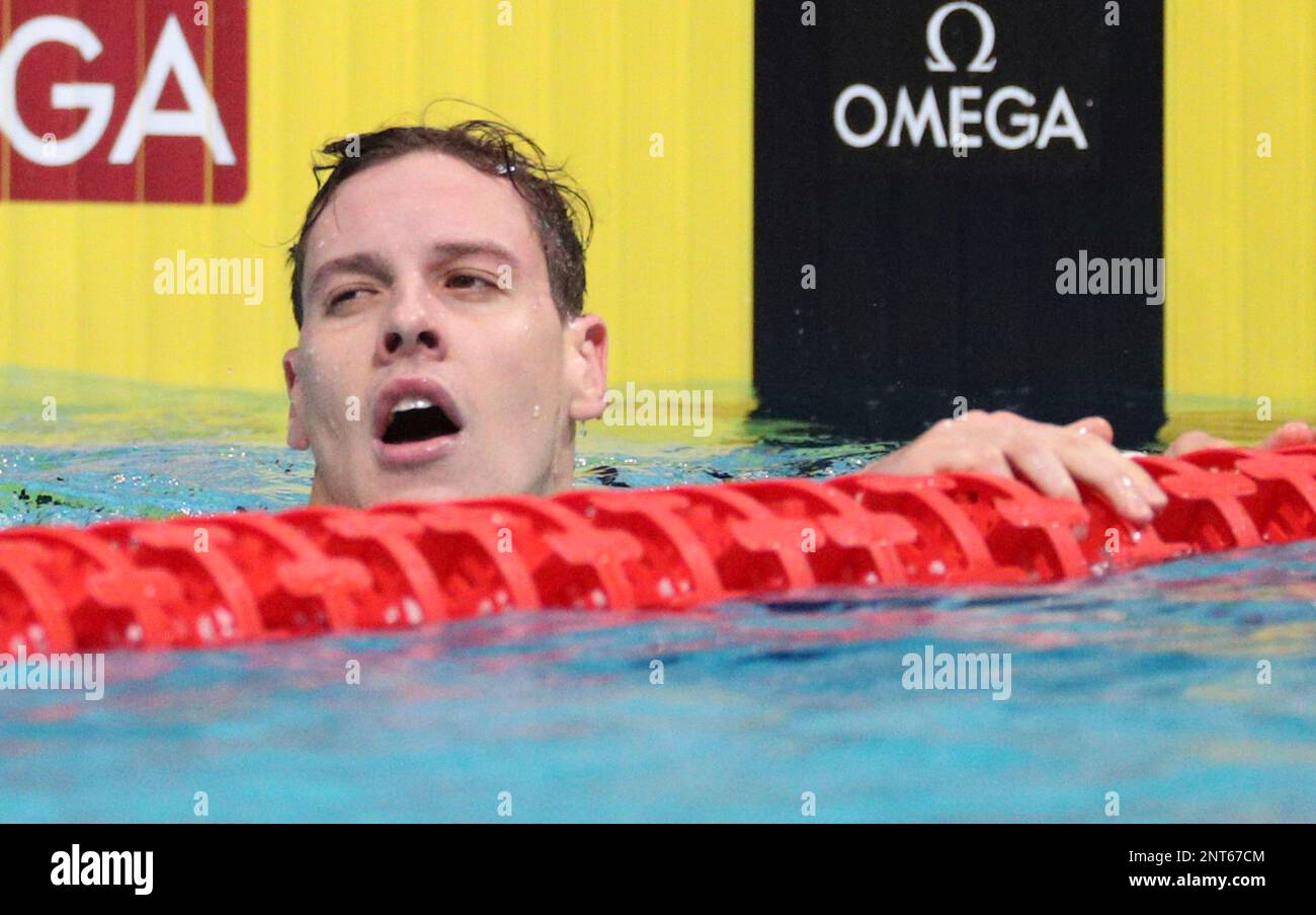 Australia's LARKIN Mitchel reacts after winning the Men's 100m ...