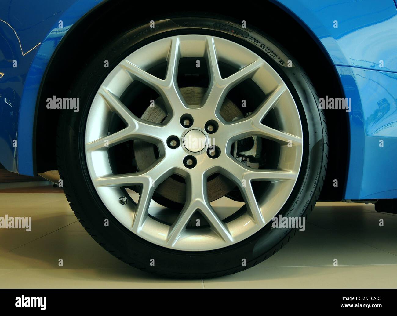 Ultralight alloy wheel mounted on a sports car closeup stock photo ...