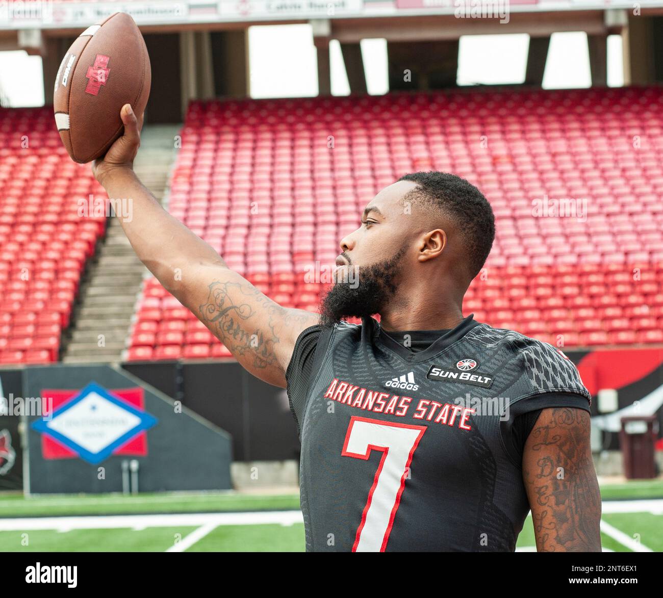 Arkansas State wide receiver Omar Bayless poses at the NCAA college ...