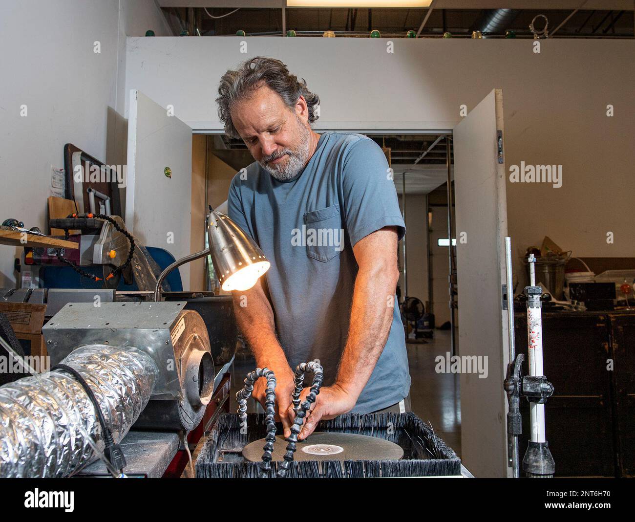 In this July 17, 2019, photo Marc Kornbluh, owner of Lincoln Hot Glass ...