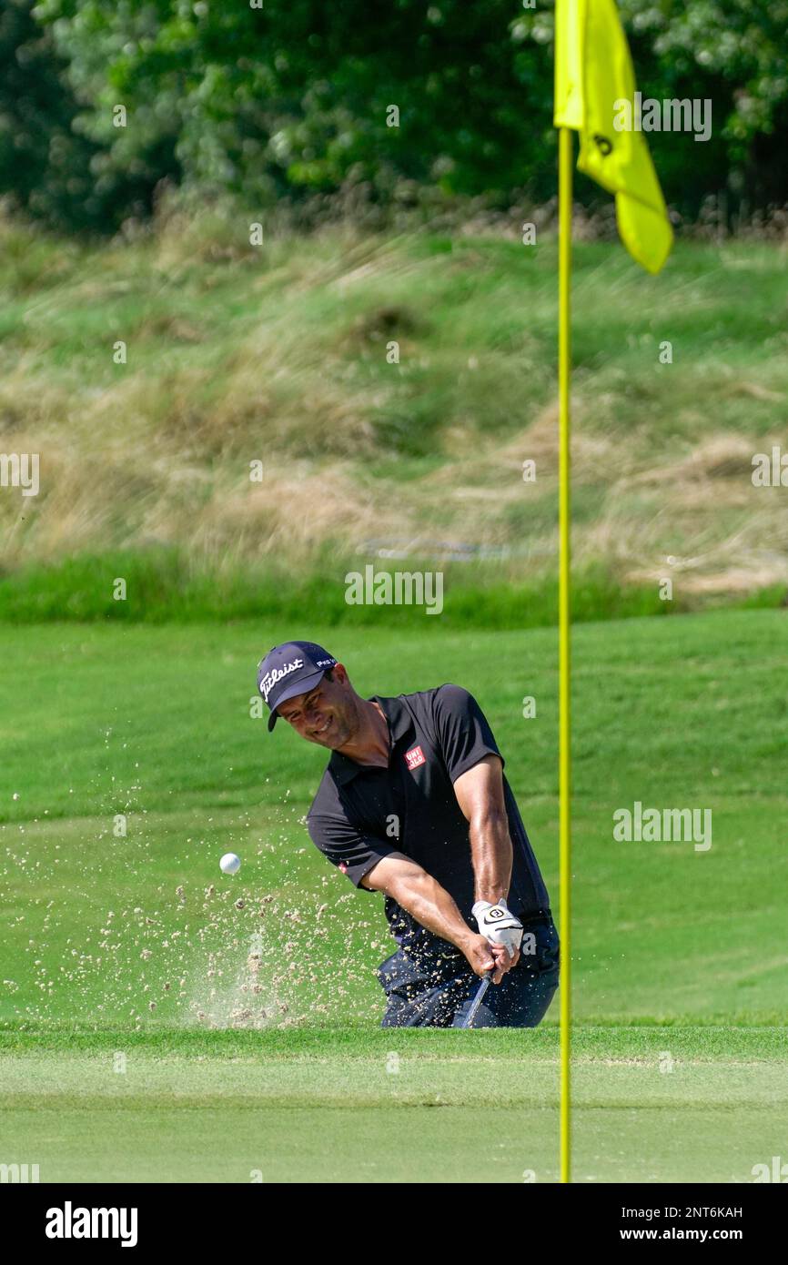 MEMPHIS, TN - JULY 28: Adam Scott plays a shot from a green-side bunker ...