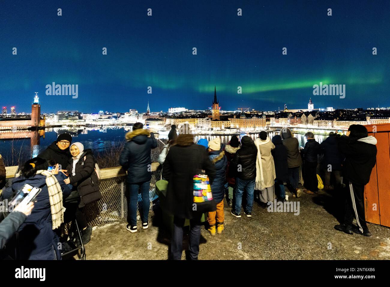 Stockholm, Sweden, on Feb. 27, 2023, People watch northern lights ...
