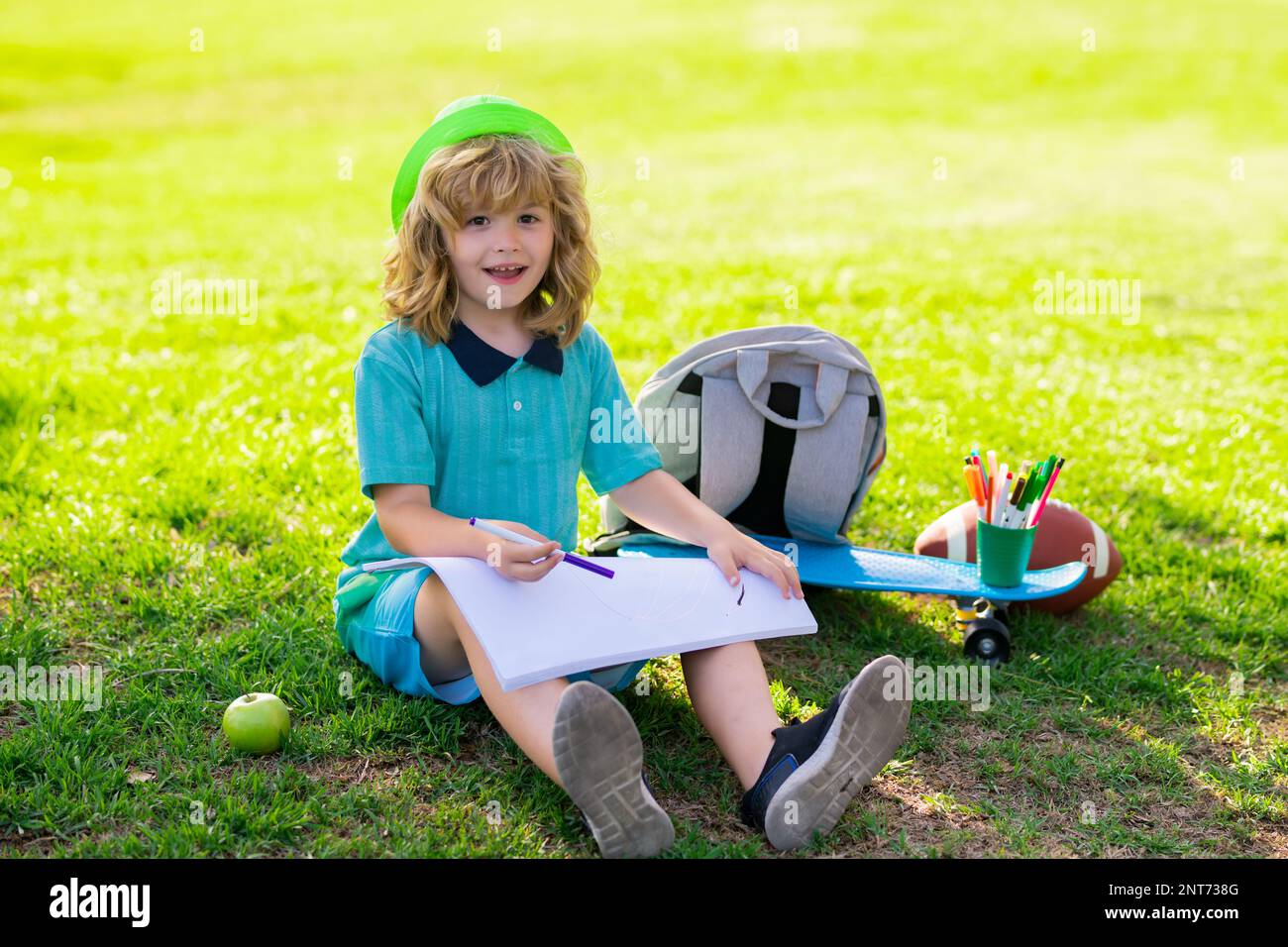 School kids drawing in summer park, painting art. Little painter draw ...