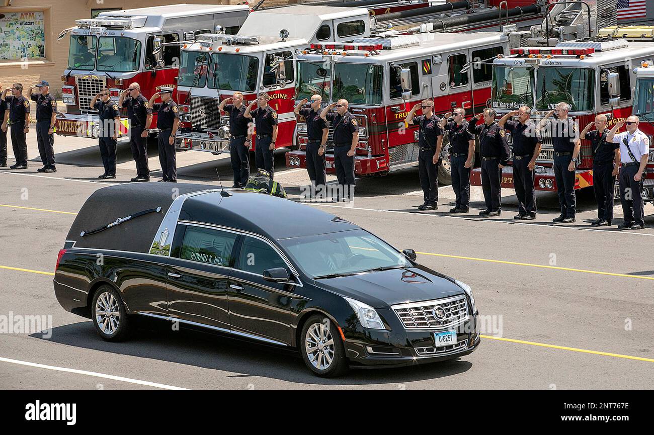 Meriden firefighters salute as the funeral procession for Woodrow ...
