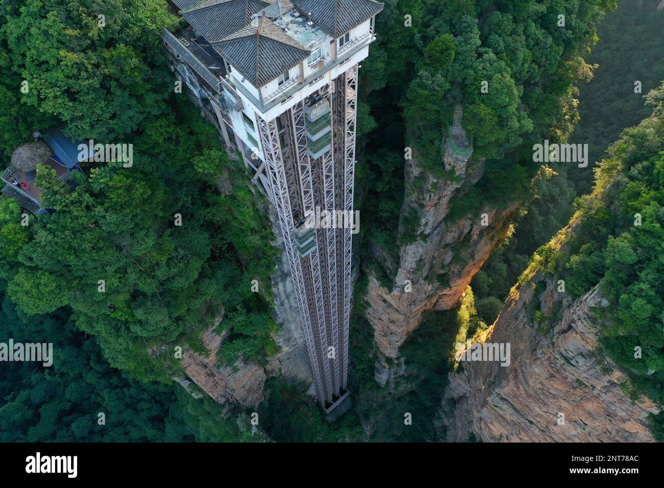 Aerial view of the Bailong Elevator built on a cliff in Zhangjiajie in ...