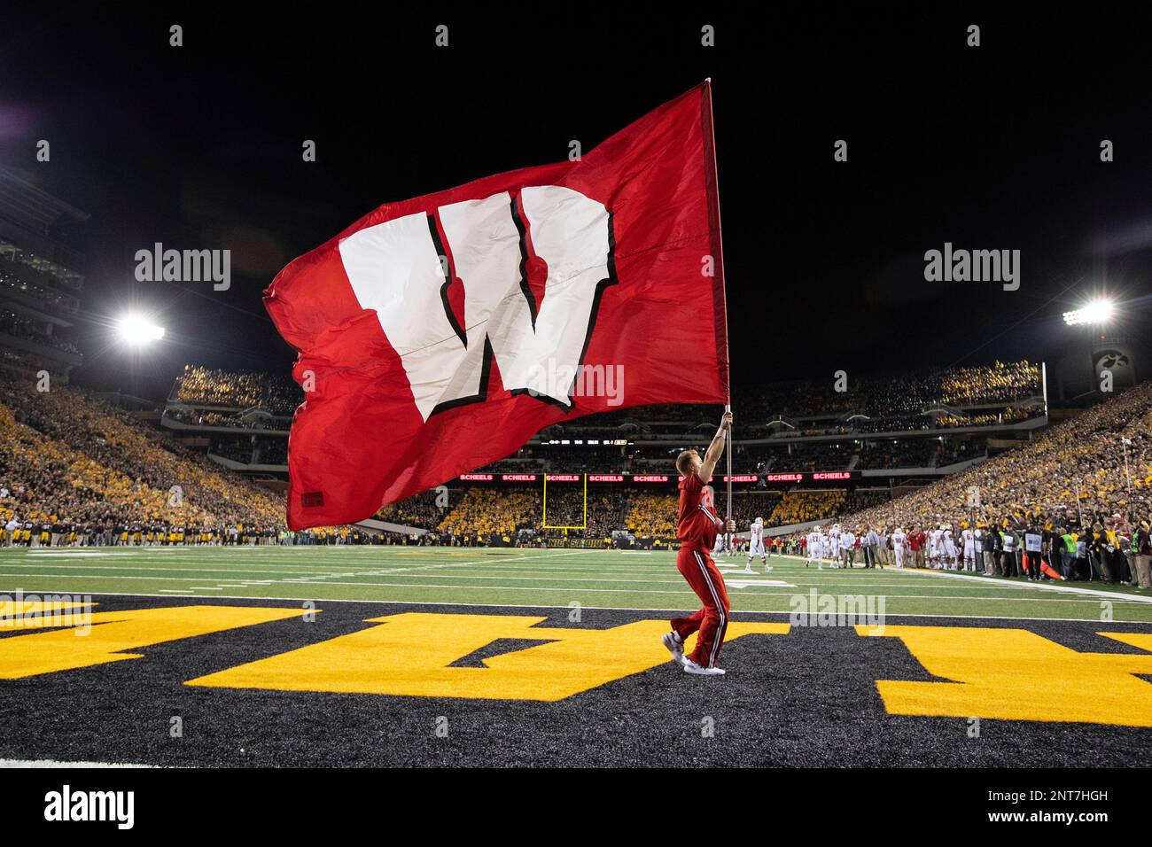 Wisconsin Badgers celebrate a touchdown during an NCAA college football ...