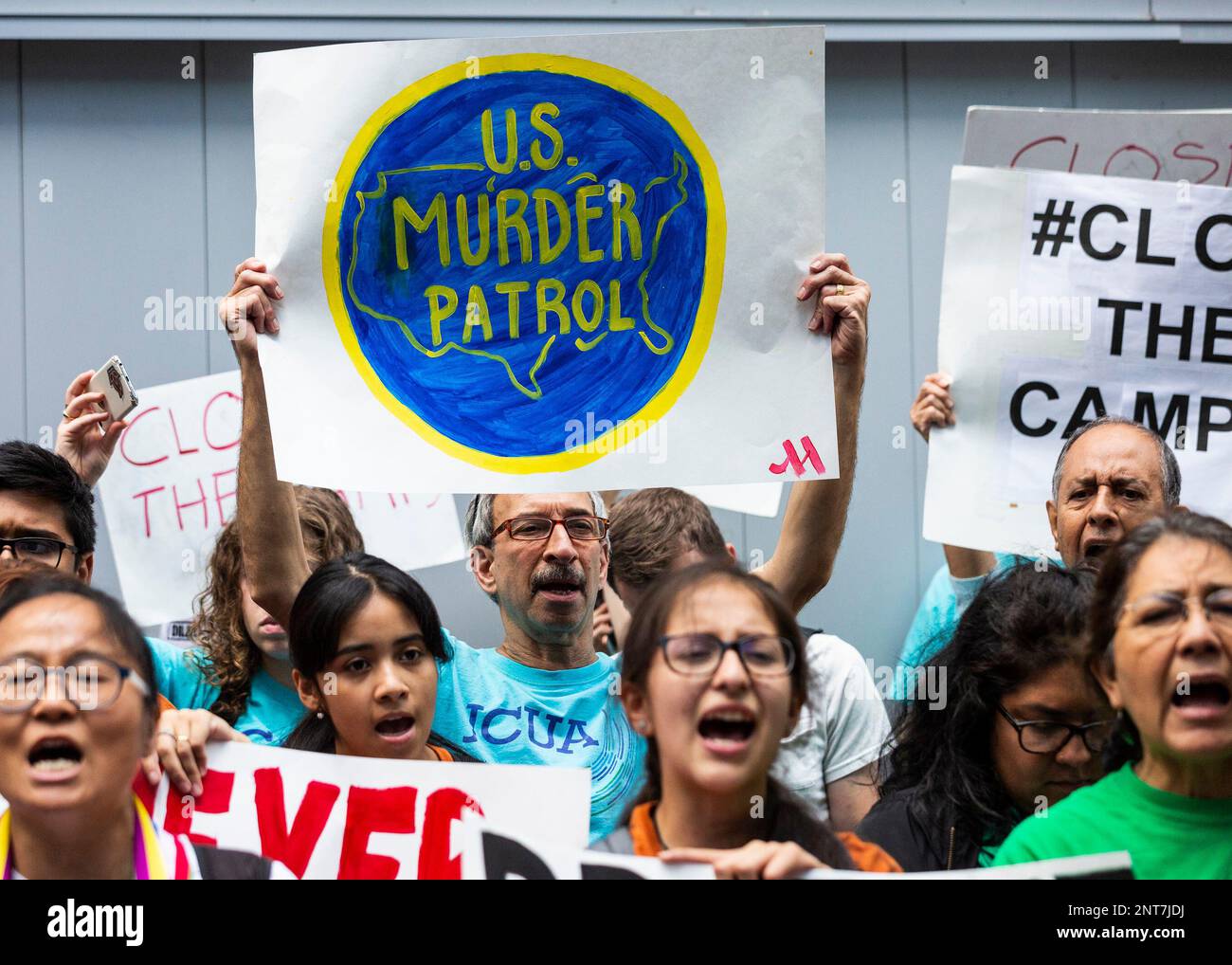 Immigrant rights activists protest outside the Marriott Marquis Chicago ...