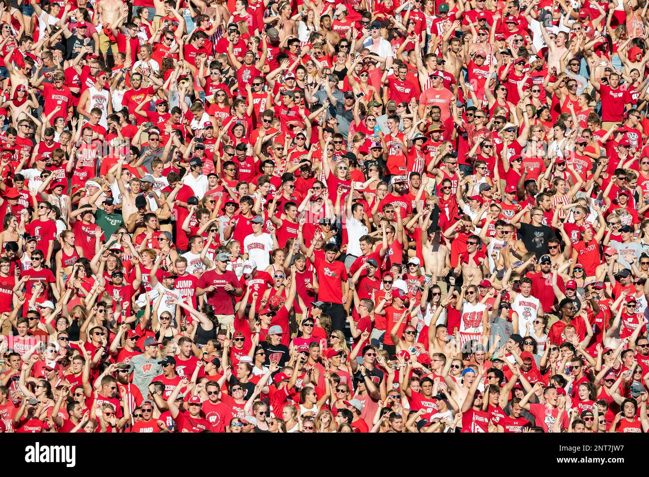 Wisconsin Badger fans dance to the song "Jump Around" before the 4th ...