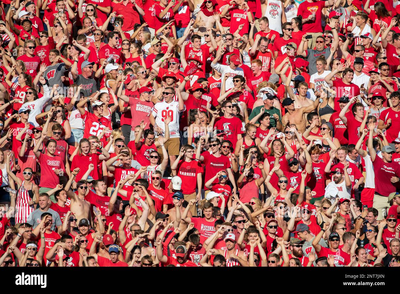 Wisconsin Badger fans dance to the song "Jump Around" before the 4th ...