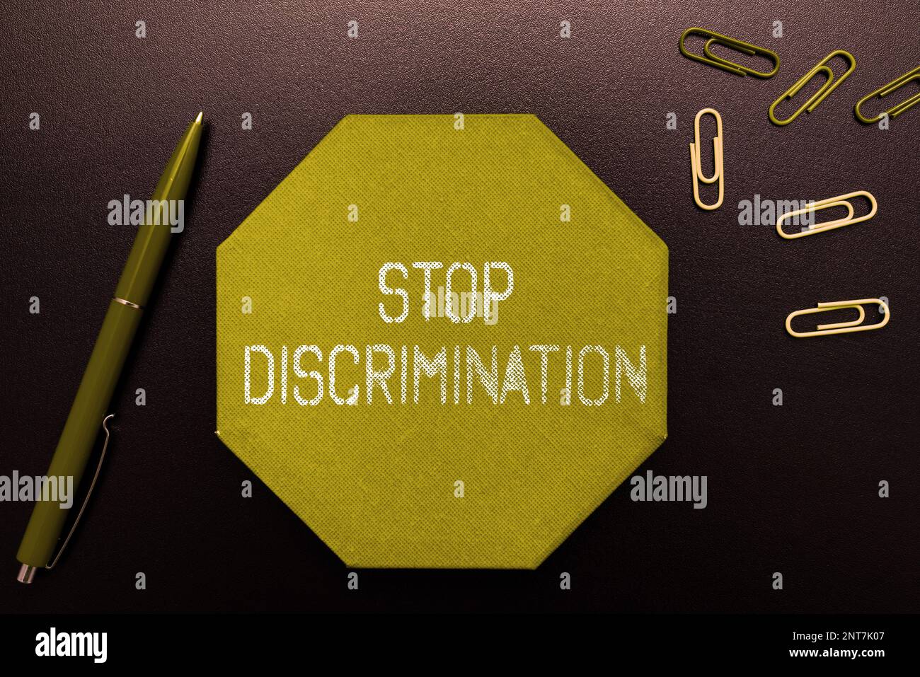 Hand writing sign Stop Discrimination. Concept meaning Prevent Illegal ...