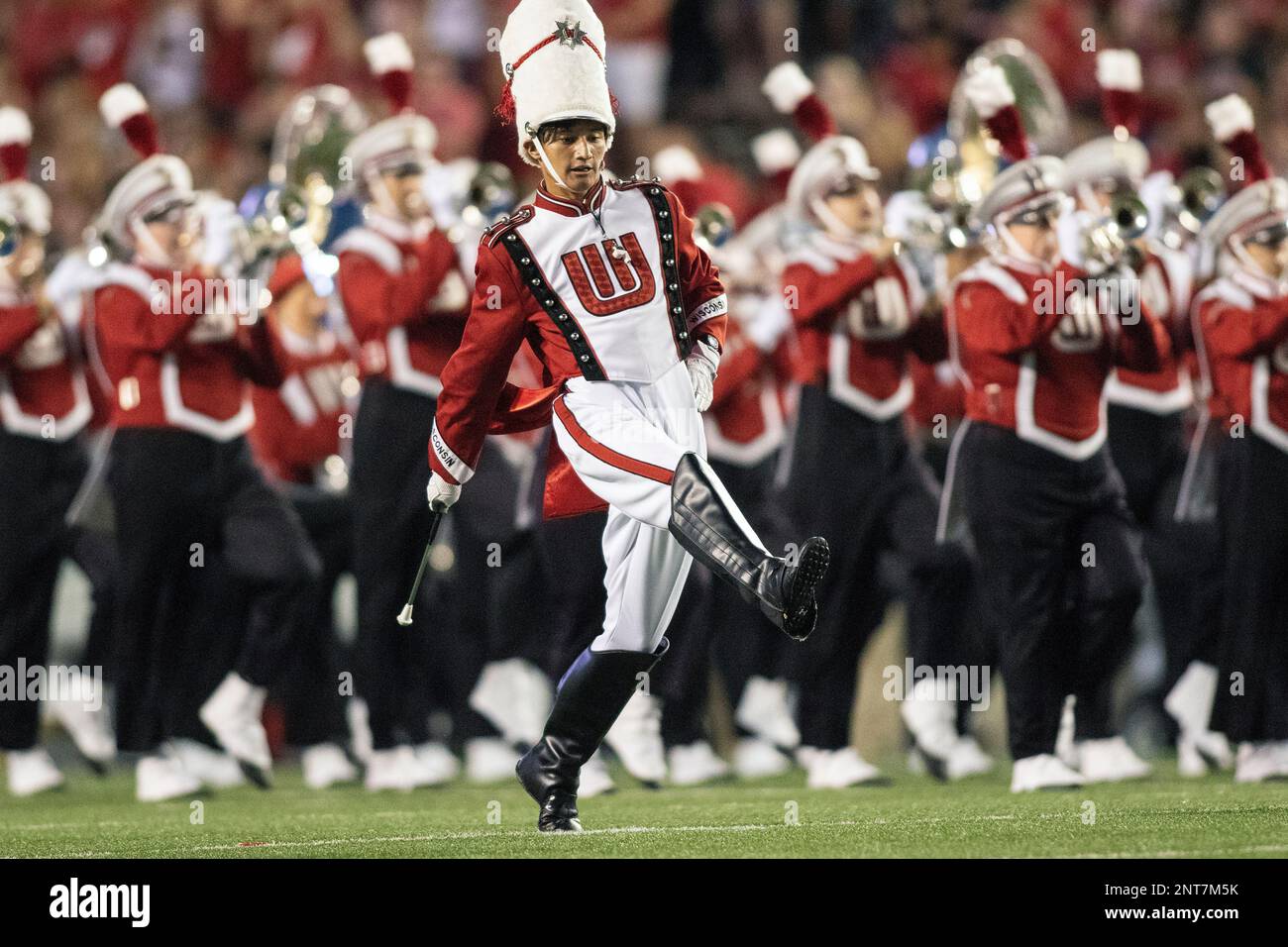 Wisconsin Badgers Band Major leads the band onto the field during an ...