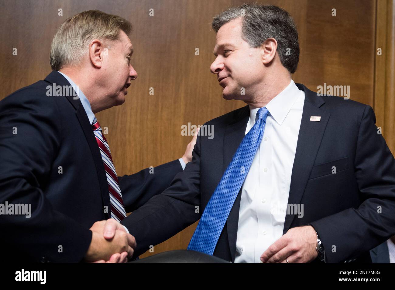 UNITED STATES - JULY 23: FBI Director Christopher Wray, right, greets ...