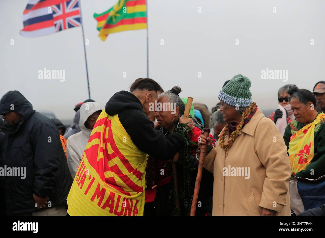Kumu hula Bradford Ikemanu Lum, left, greets with kupuna Noe Noe Wong ...