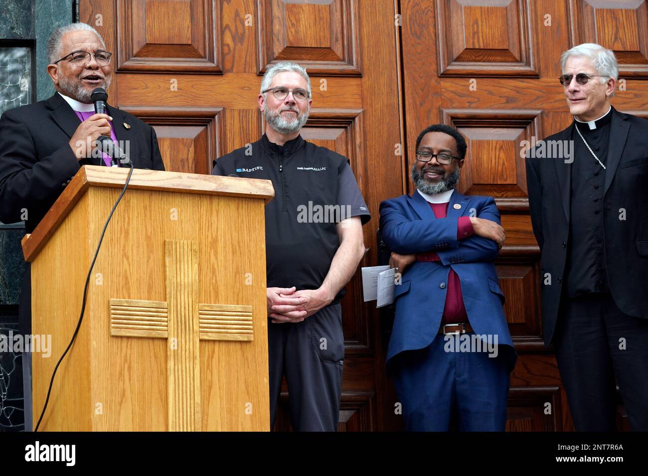 Bishop Ronnie C. Crudup Sr., of New Horizon Church International, left ...