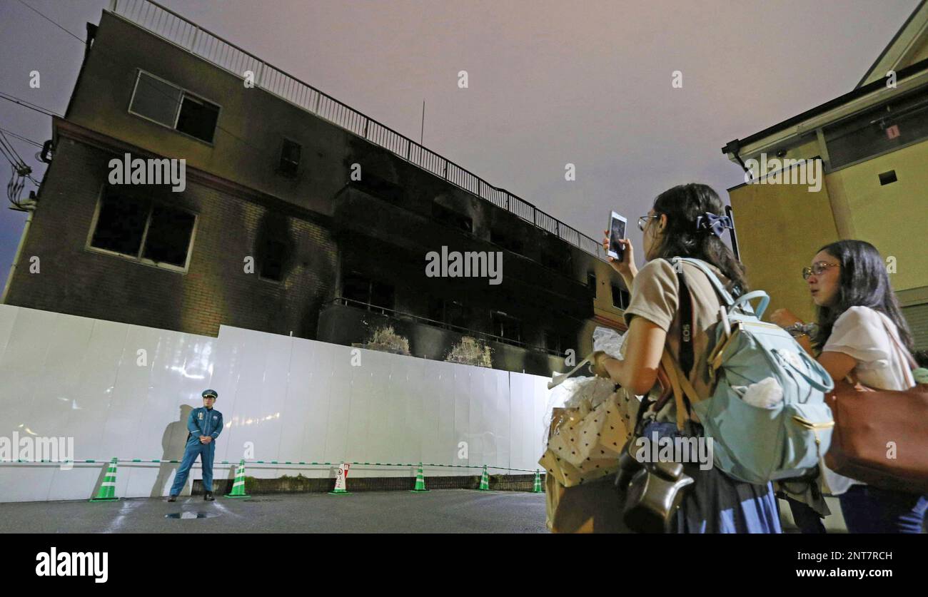 A photo shows the white walled arson site of Kyoto Animation Co., Ltd ...