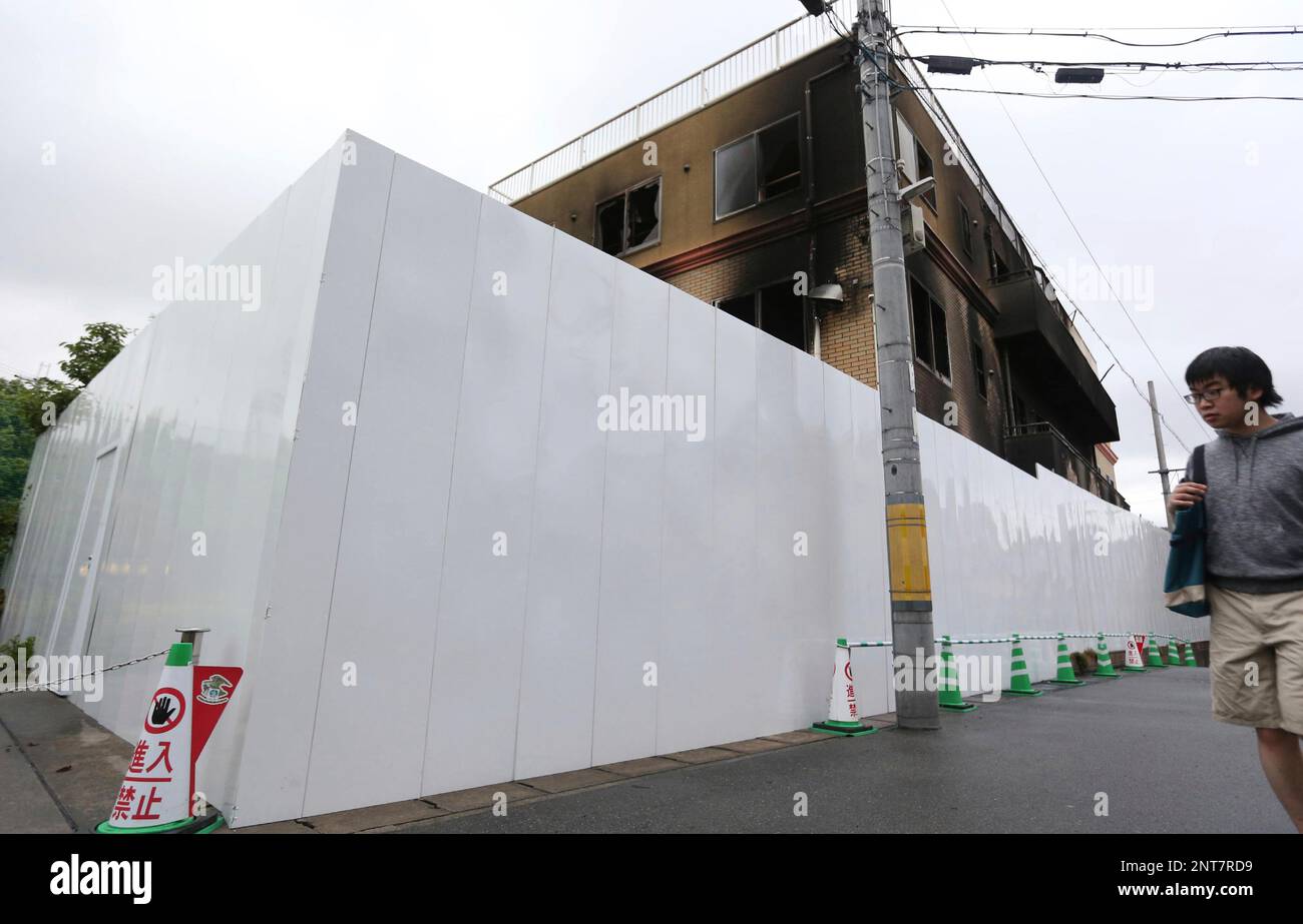 A photo shows the white walled arson site of Kyoto Animation Co., Ltd ...