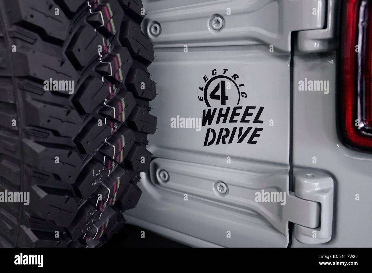 An "Electric 4 Wheel Drive" sticker is affixed to the tailgate of a ...