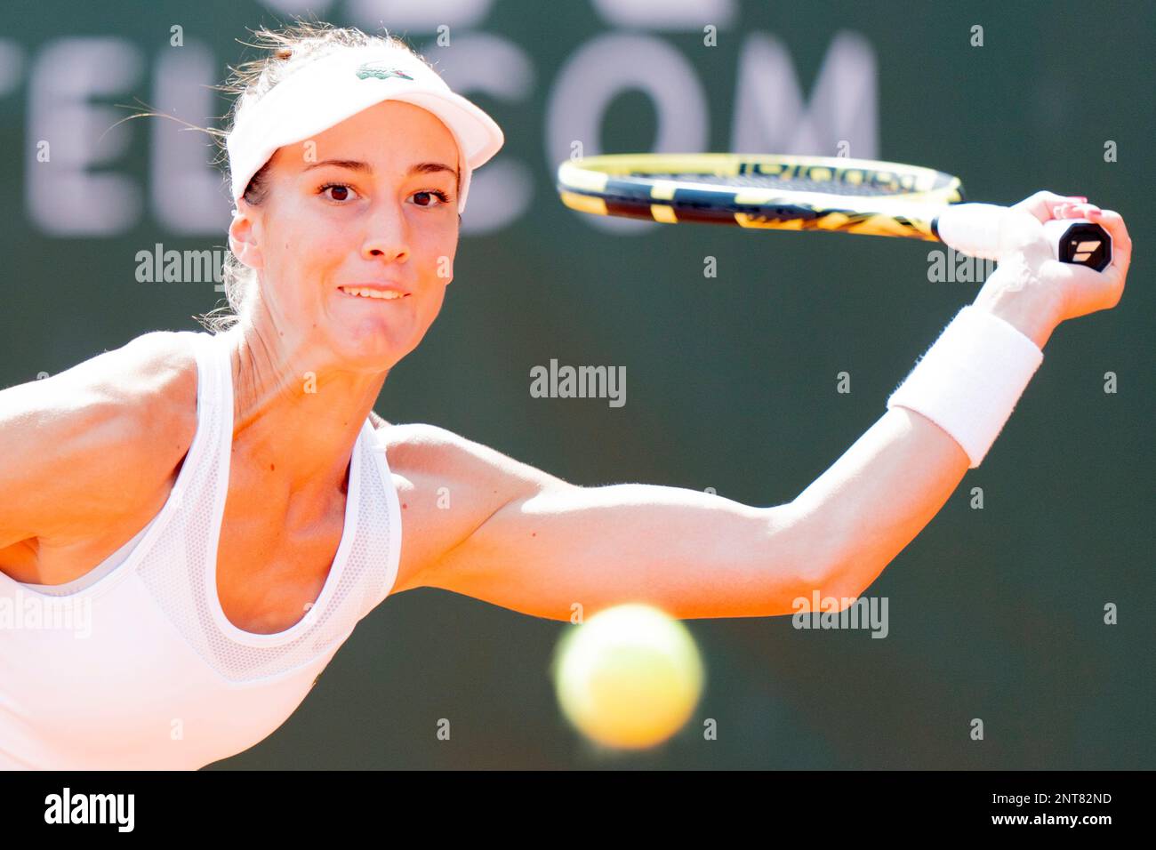 Bernarda Pera from USA returns the ball during the semi final match ...