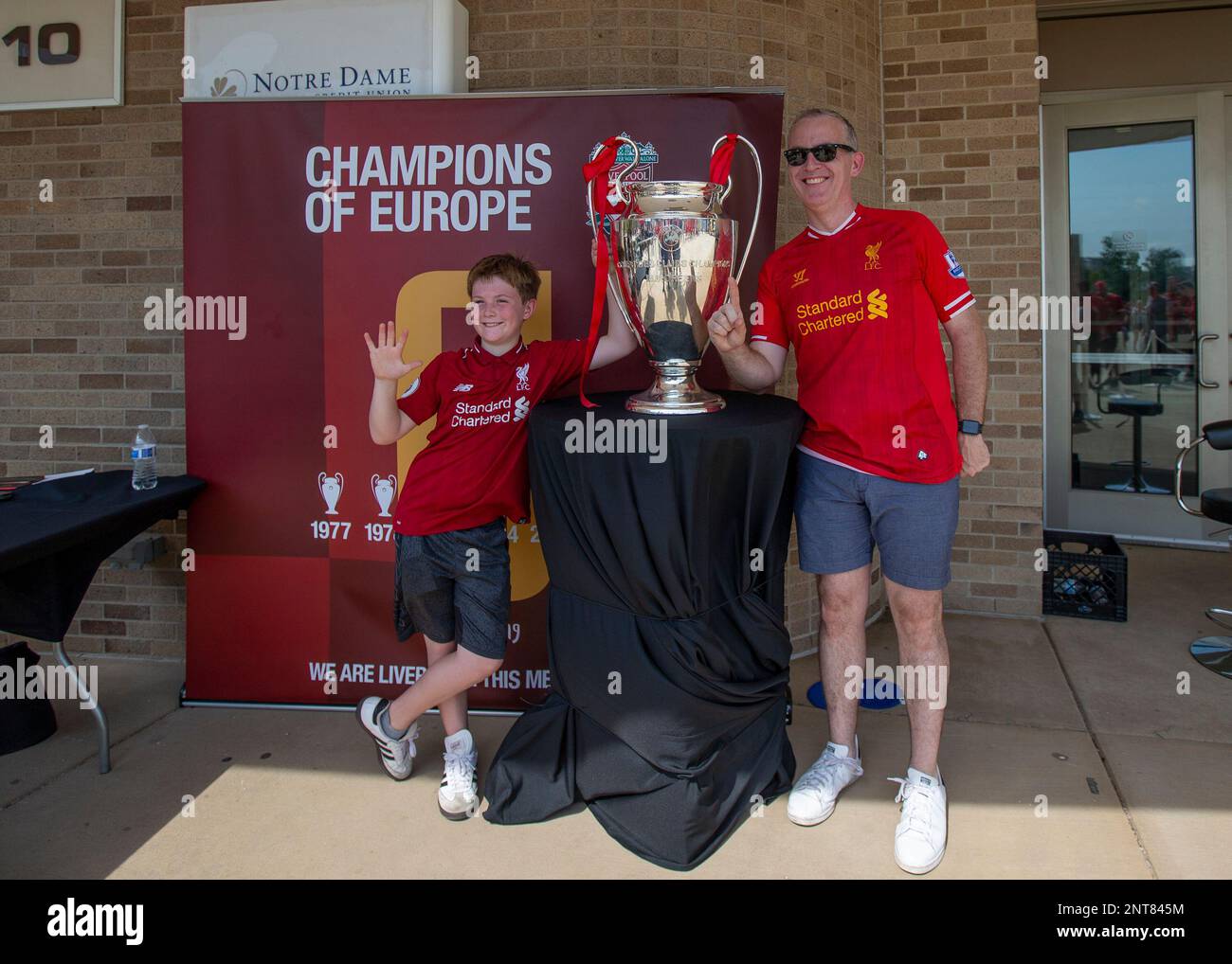 SOUTH BEND, IN - JULY 19: Father and son pose for a photo with the UEFA ...
