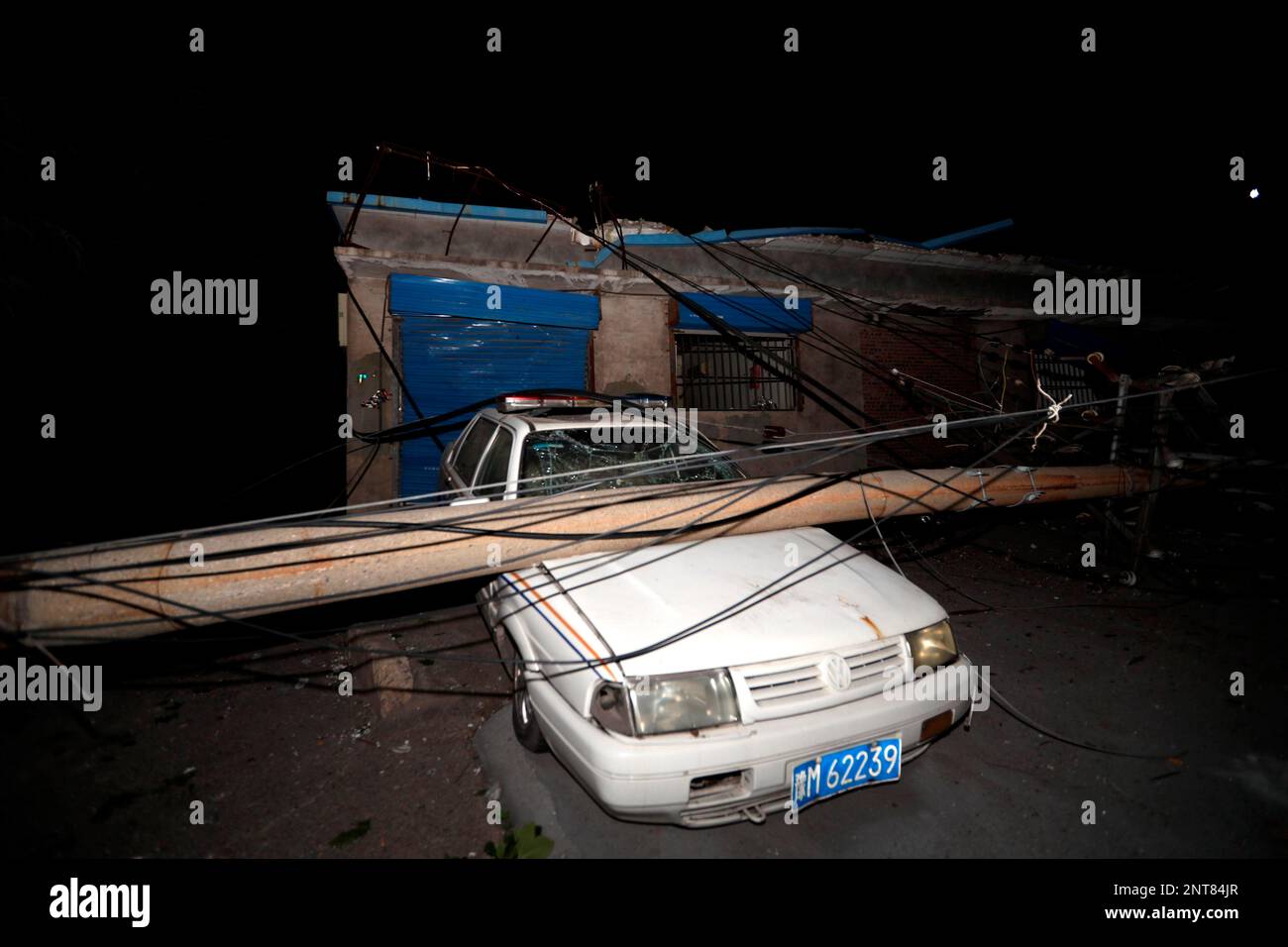 Photo taken Saturday, July 20, 2019 of a car is seen smashed by an ...