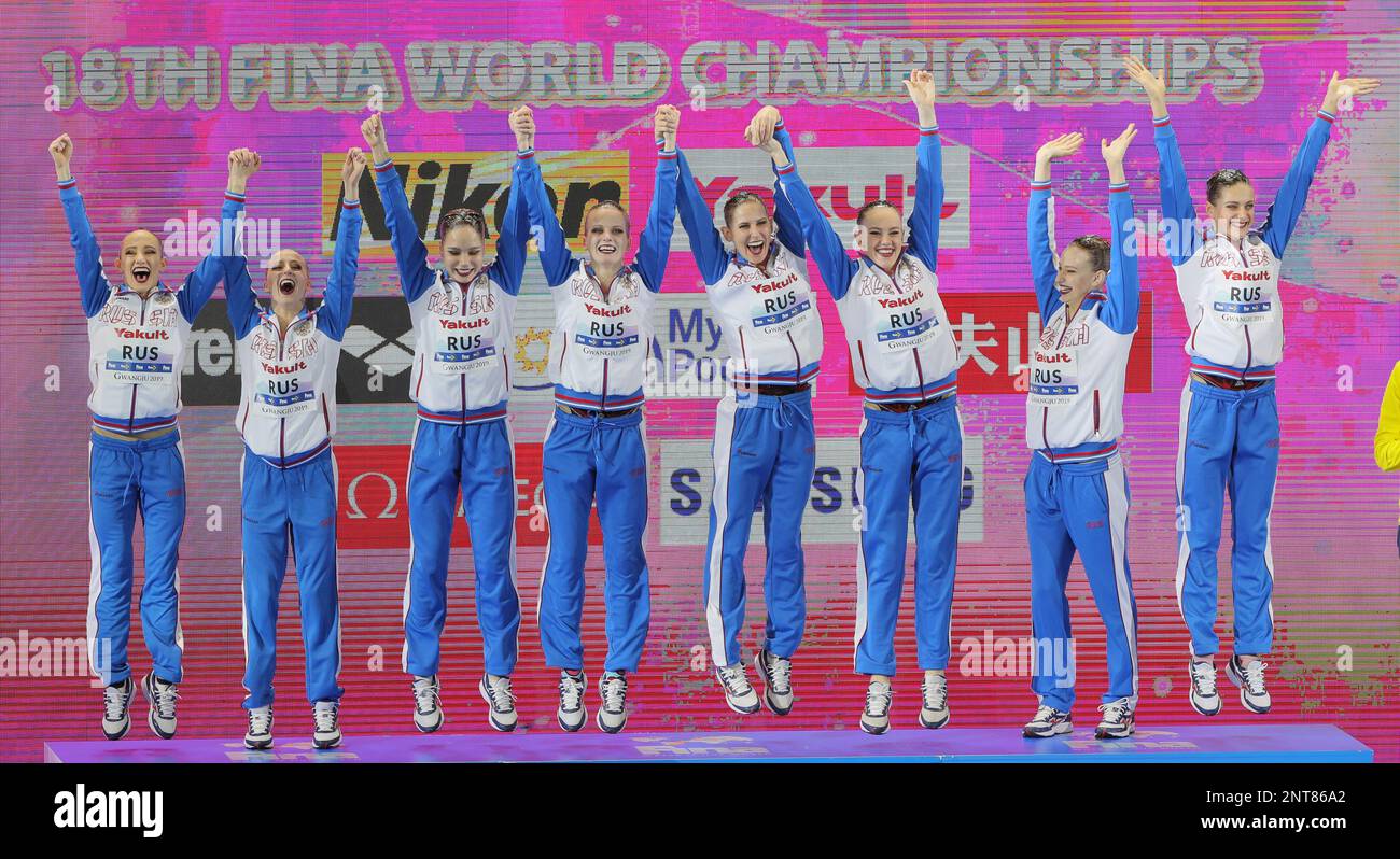 Russia's swimmers celebrate on the podium after winning the Artistic ...