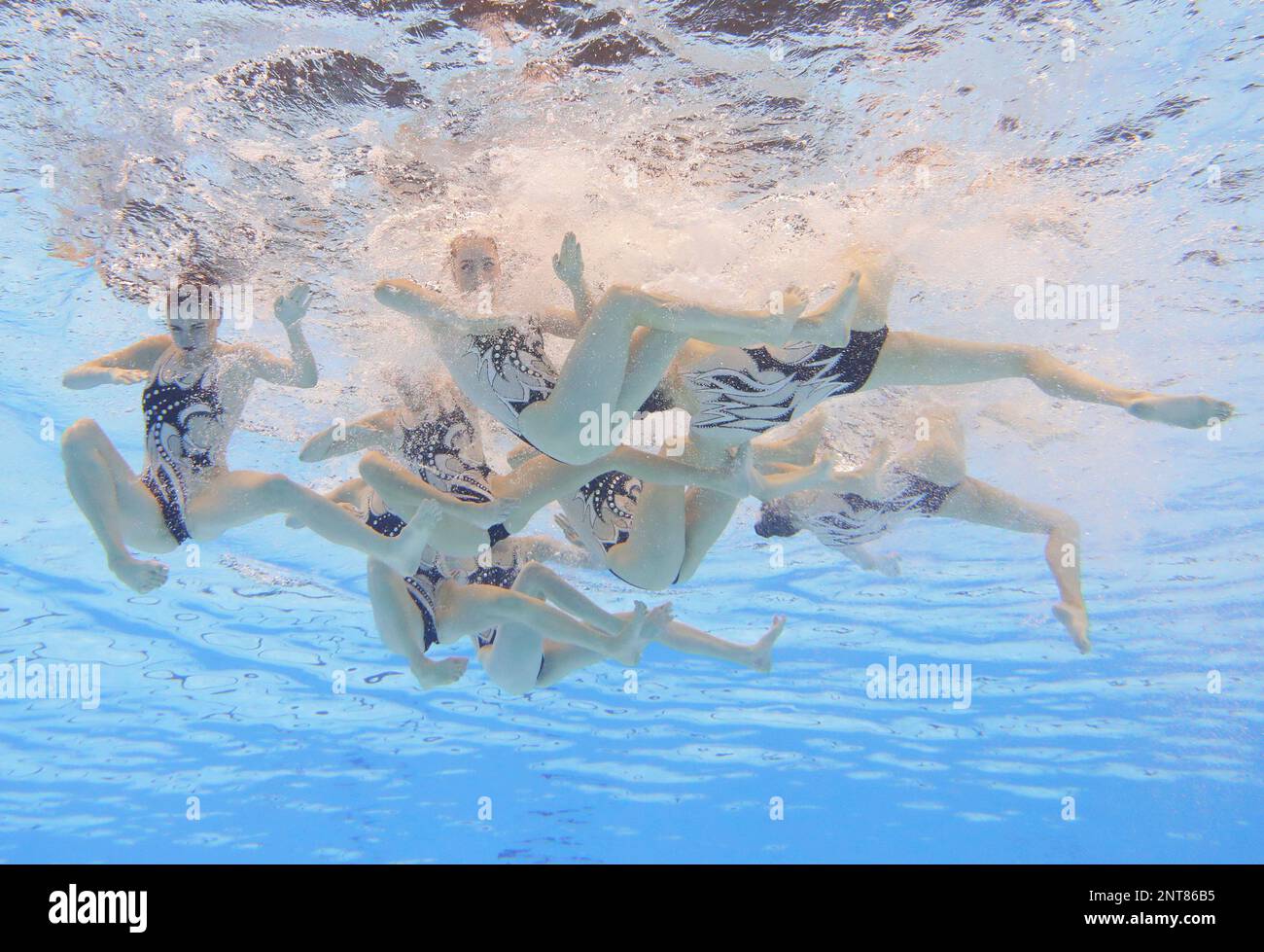 Ukraine's swimmers perform during Artistic Swimming Women Team Free ...