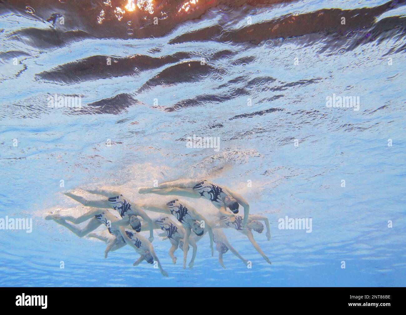 Ukraine's swimmers perform during Artistic Swimming Women Team Free ...
