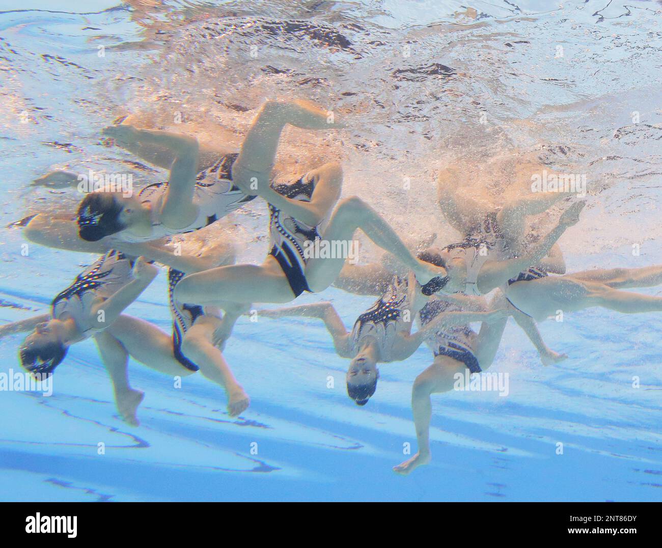 Ukraine's swimmers perform during Artistic Swimming Women Team Free ...