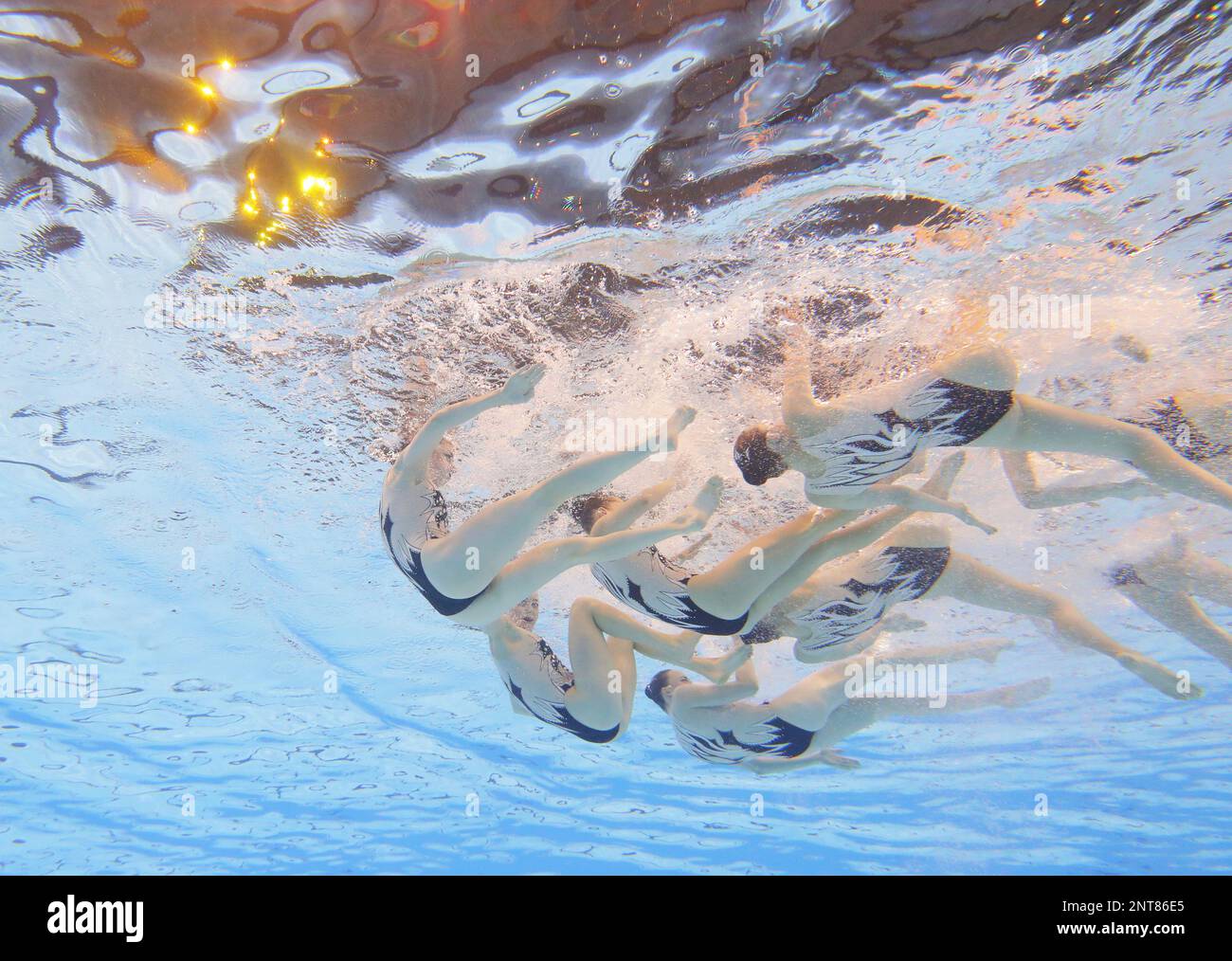 Ukraine's swimmers perform during Artistic Swimming Women Team Free ...