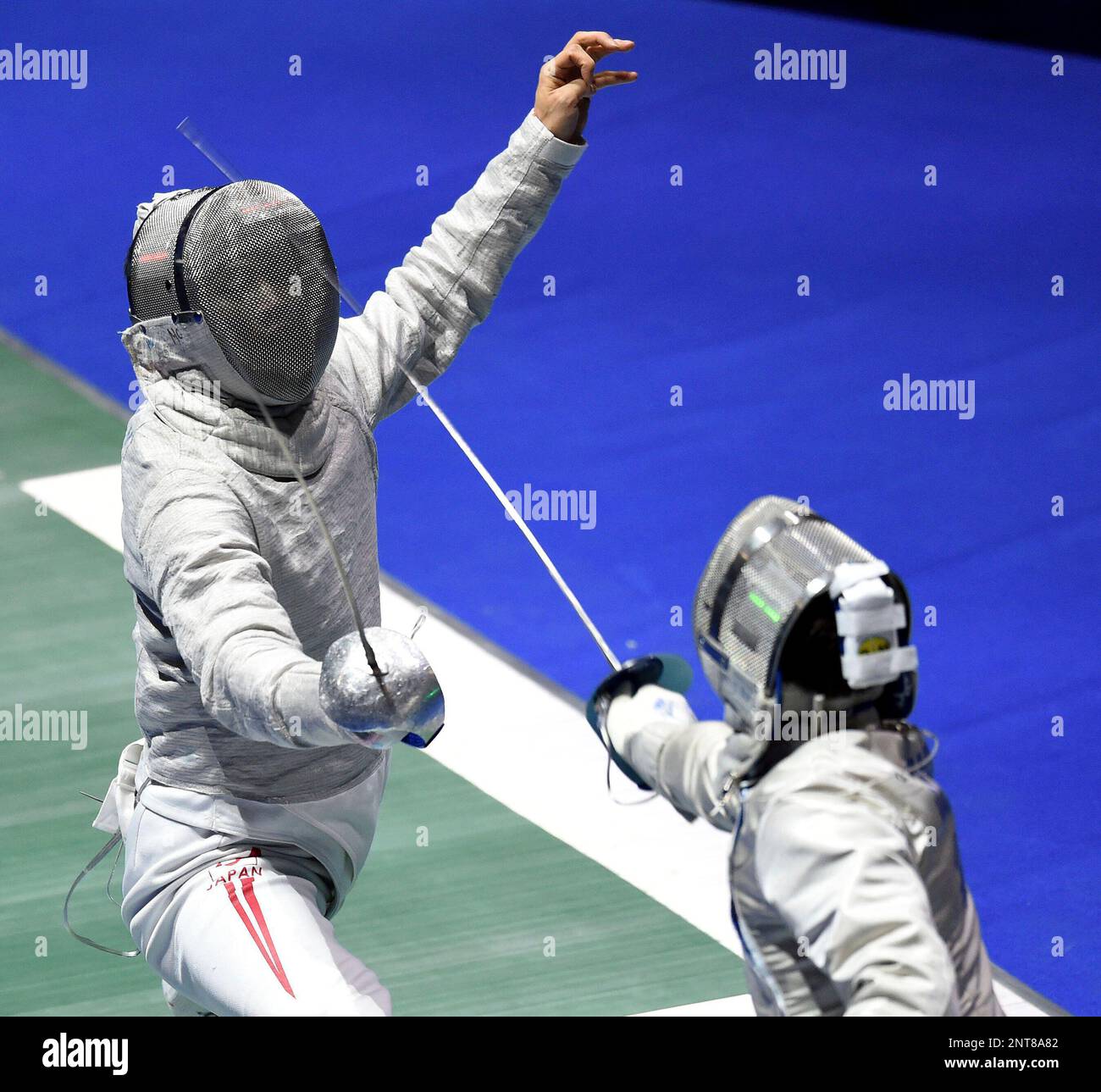 Aron Szilagyi, right, of Hungary and Kento Yoshida of Japan fight in ...
