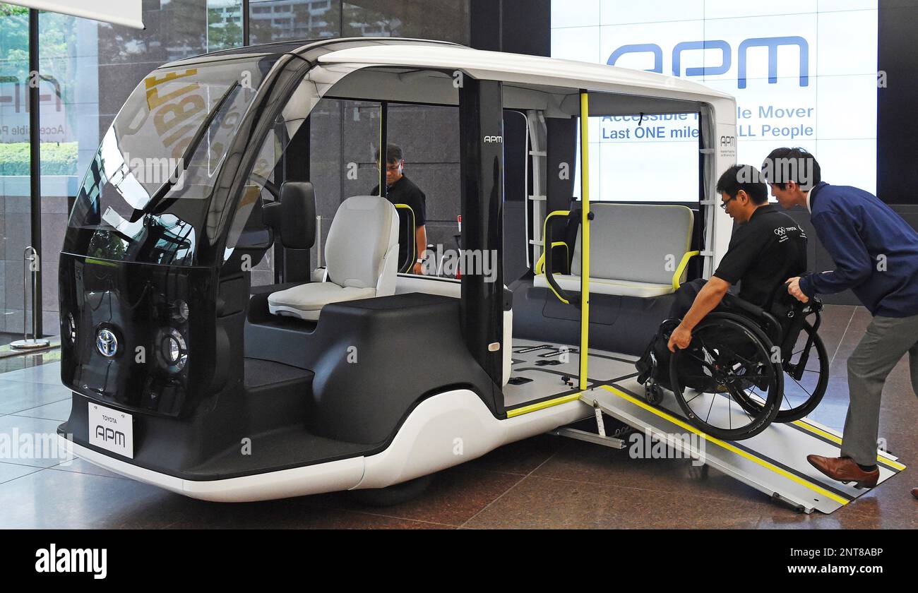 A photo shows a mobility "APM" developed by Toyota Motor Corporation ...