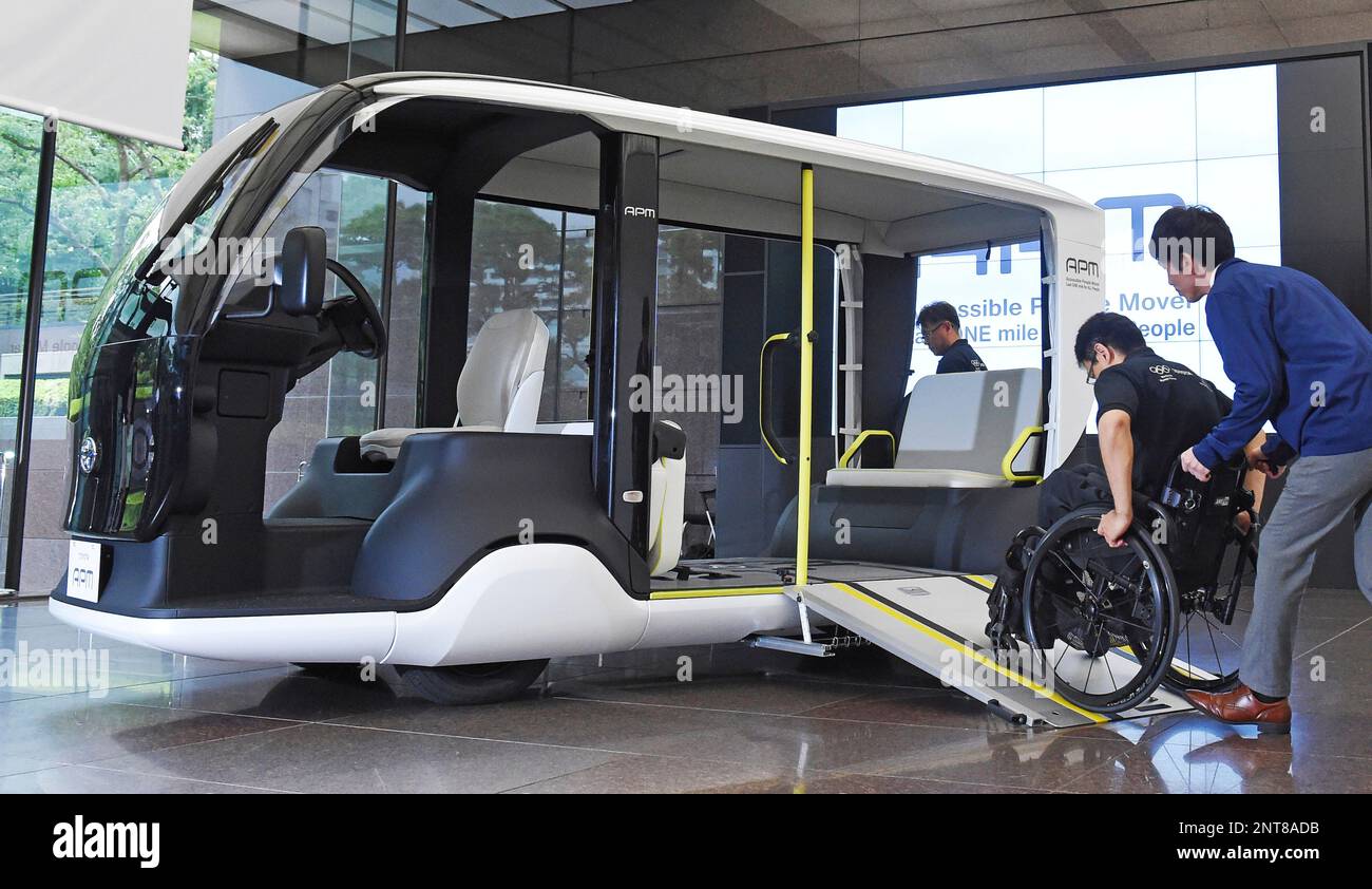 A photo shows a mobility "APM" developed by Toyota Motor Corporation ...
