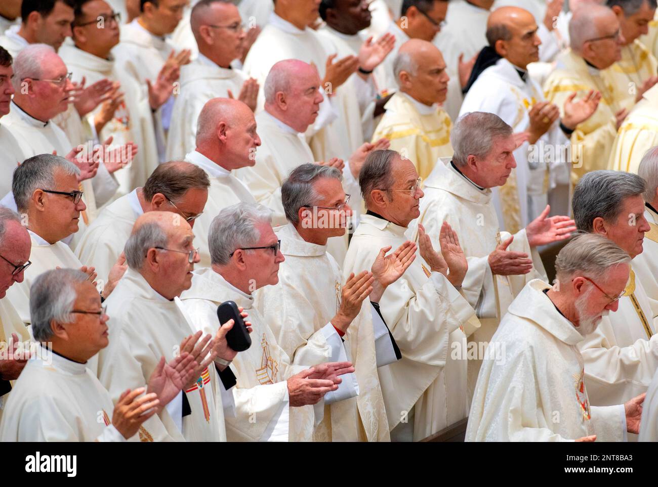 Priests pray during the Christ Cathedral Solemn Mass of Dedication ...