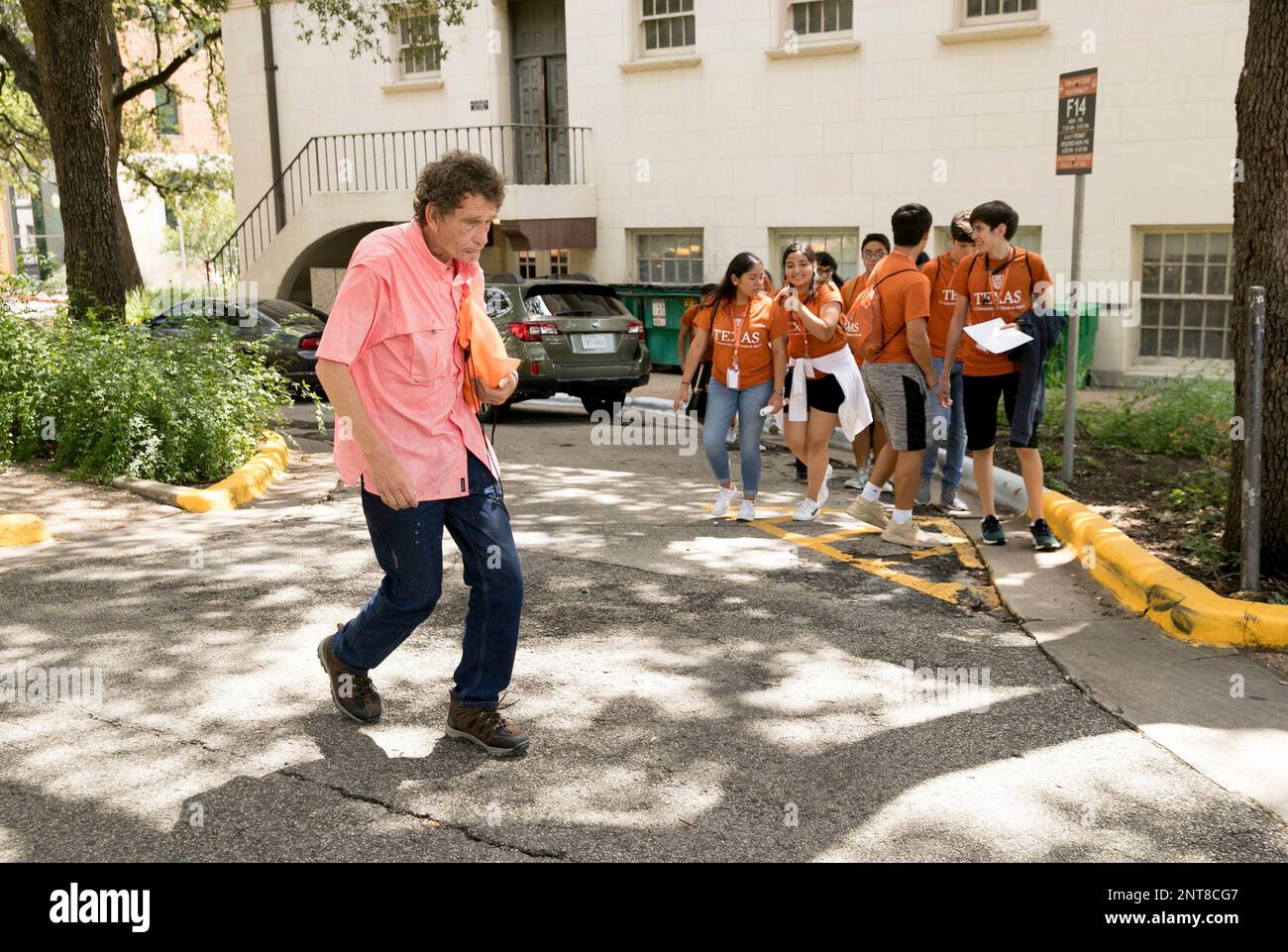 UT student David Carter walks through campus after a class on Friday ...