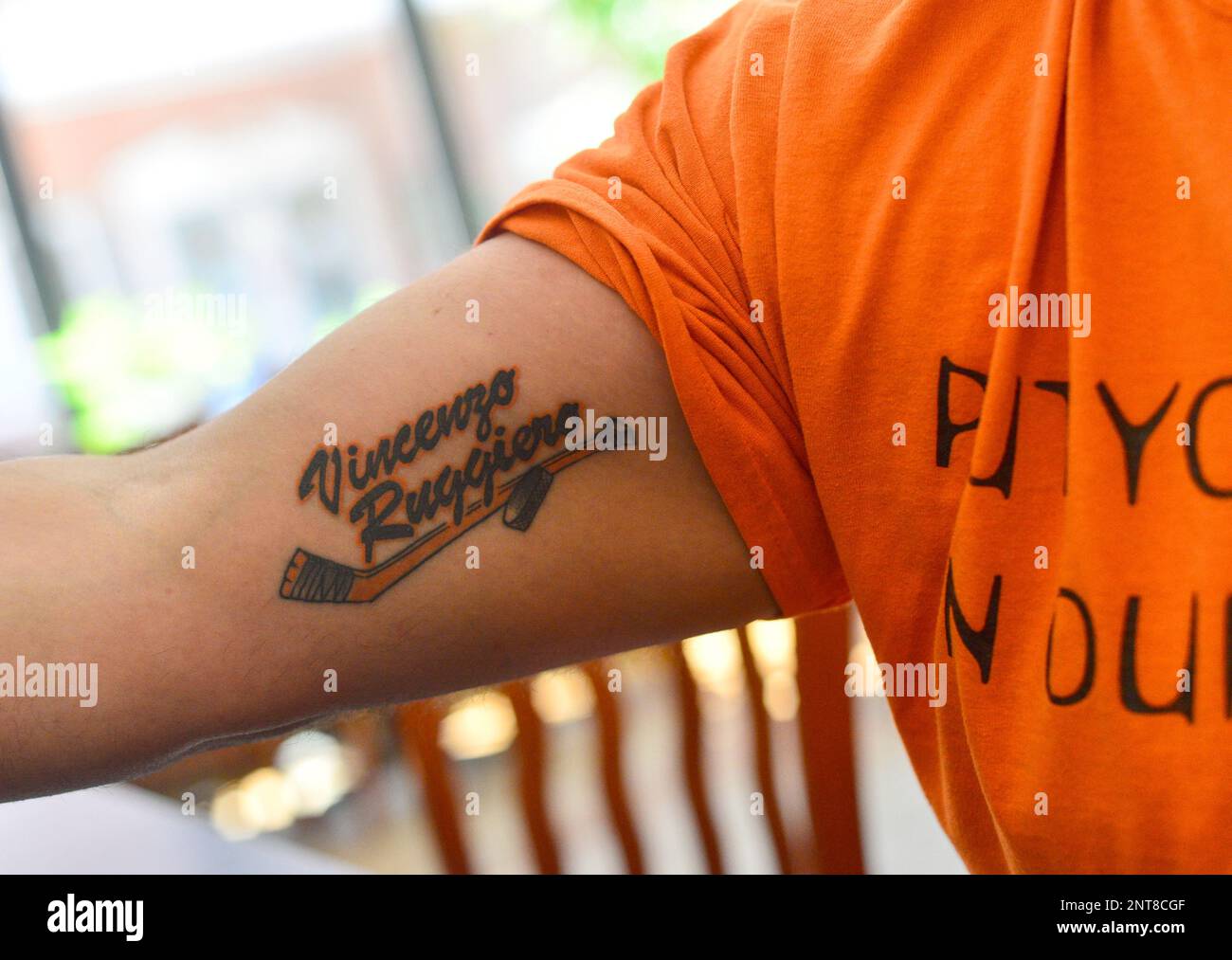 In a July 2, 2019 photo,Jim Ruggiero shows off a tattoo that he got to ...
