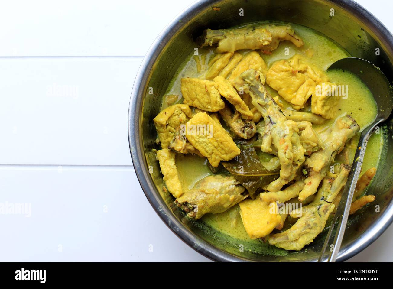 Opor Ayam Ceker, Indonesian Yellow Curry Traditional Food in a Bowl ...