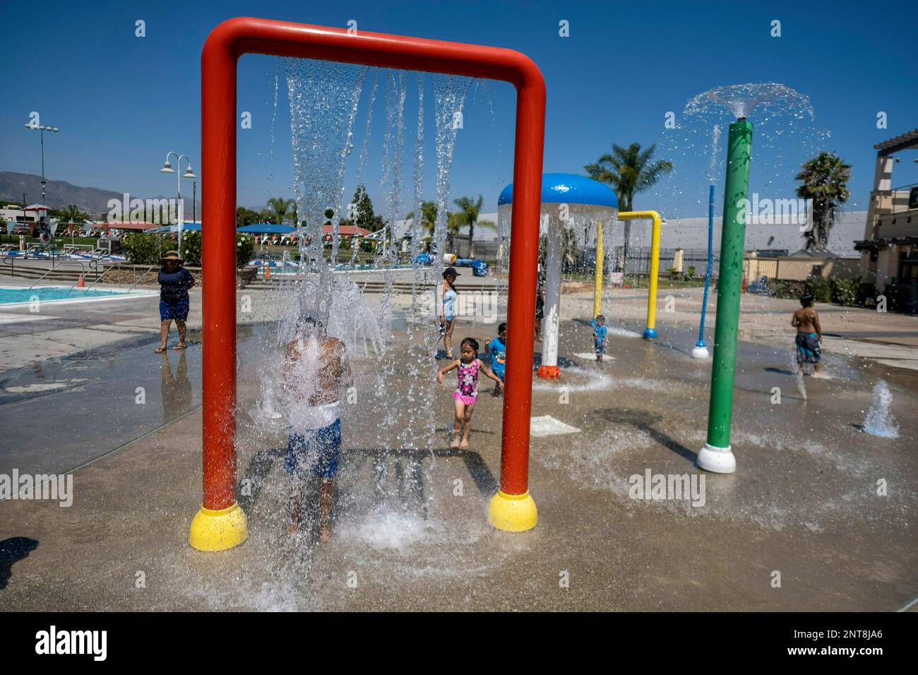 People cool off at the San Fernando Regional Pool in San Fernando, July ...