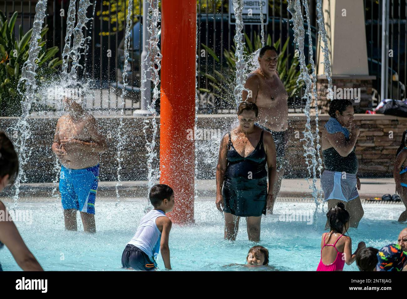 People cool off at the San Fernando Regional Pool in San Fernando, July ...